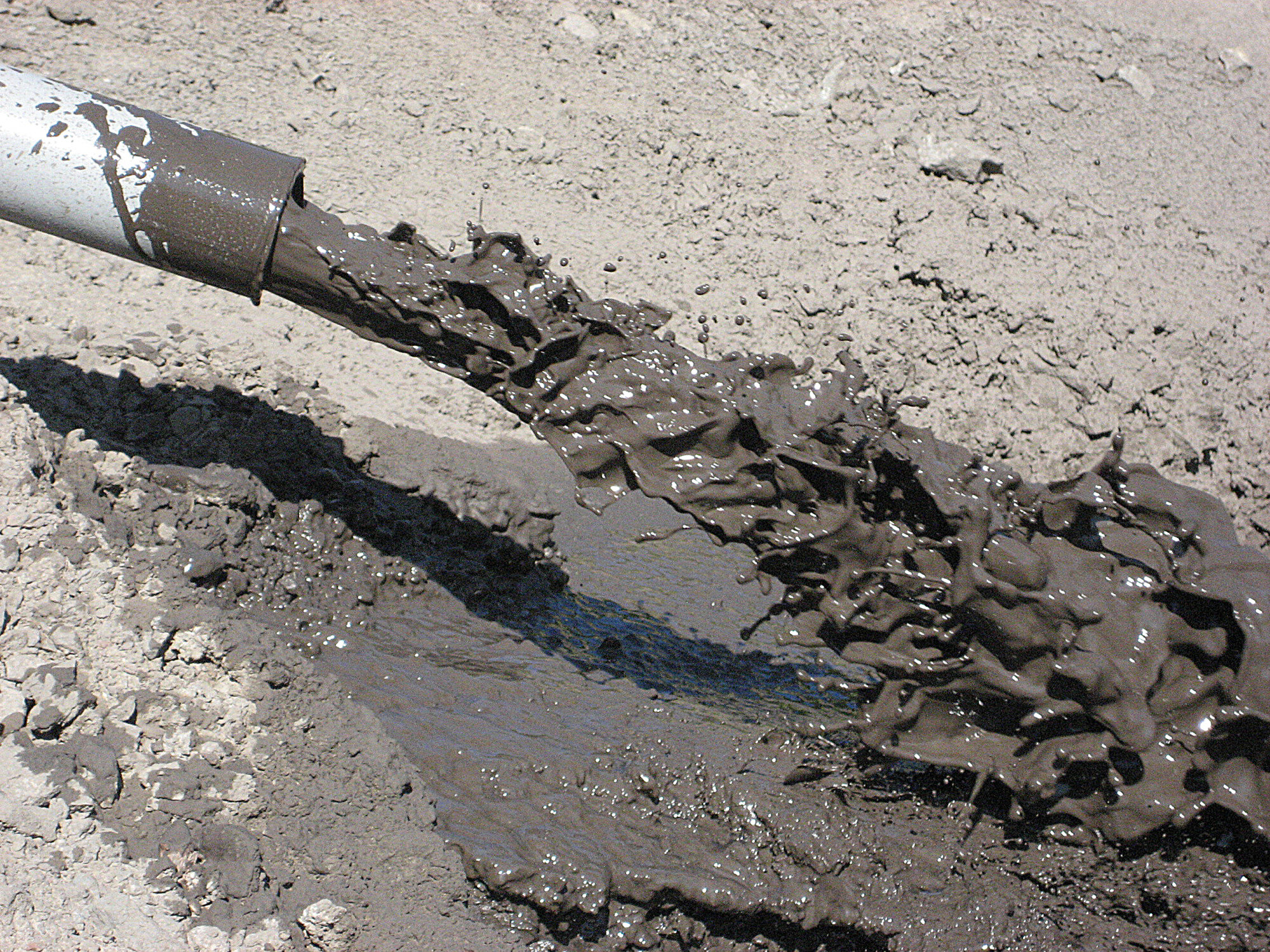 Single-shaft continuous mixer for dry or moist fine materials
