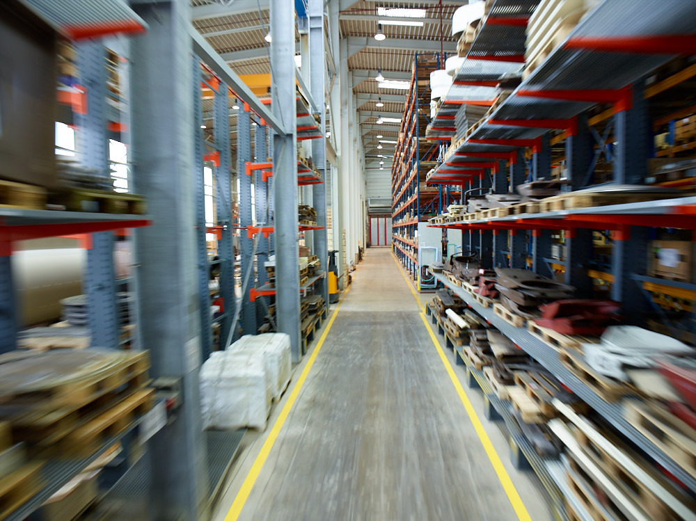 Spare parts warehouse holding original parts, even for older machines